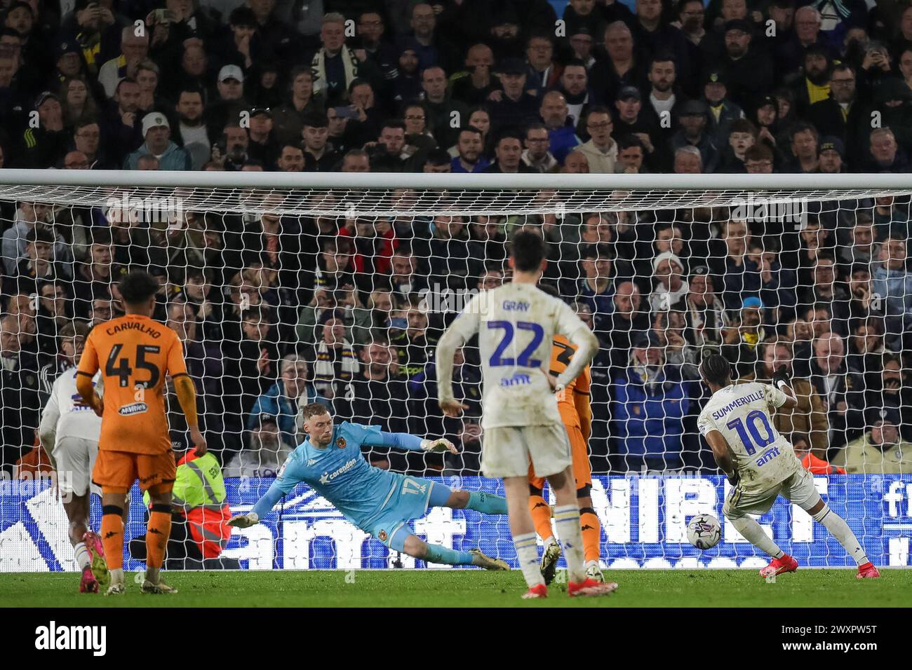 Crysencio Summerville of Leeds United scores from the penalty spot and ...