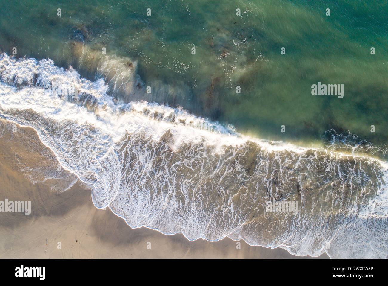 Sunlight on breaking wave hi-res stock photography and images - Alamy