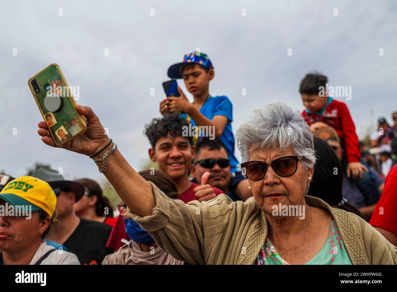 HERMOSILLO, MEXICO - MARCH 30: Cell phone take photo , old woman ...