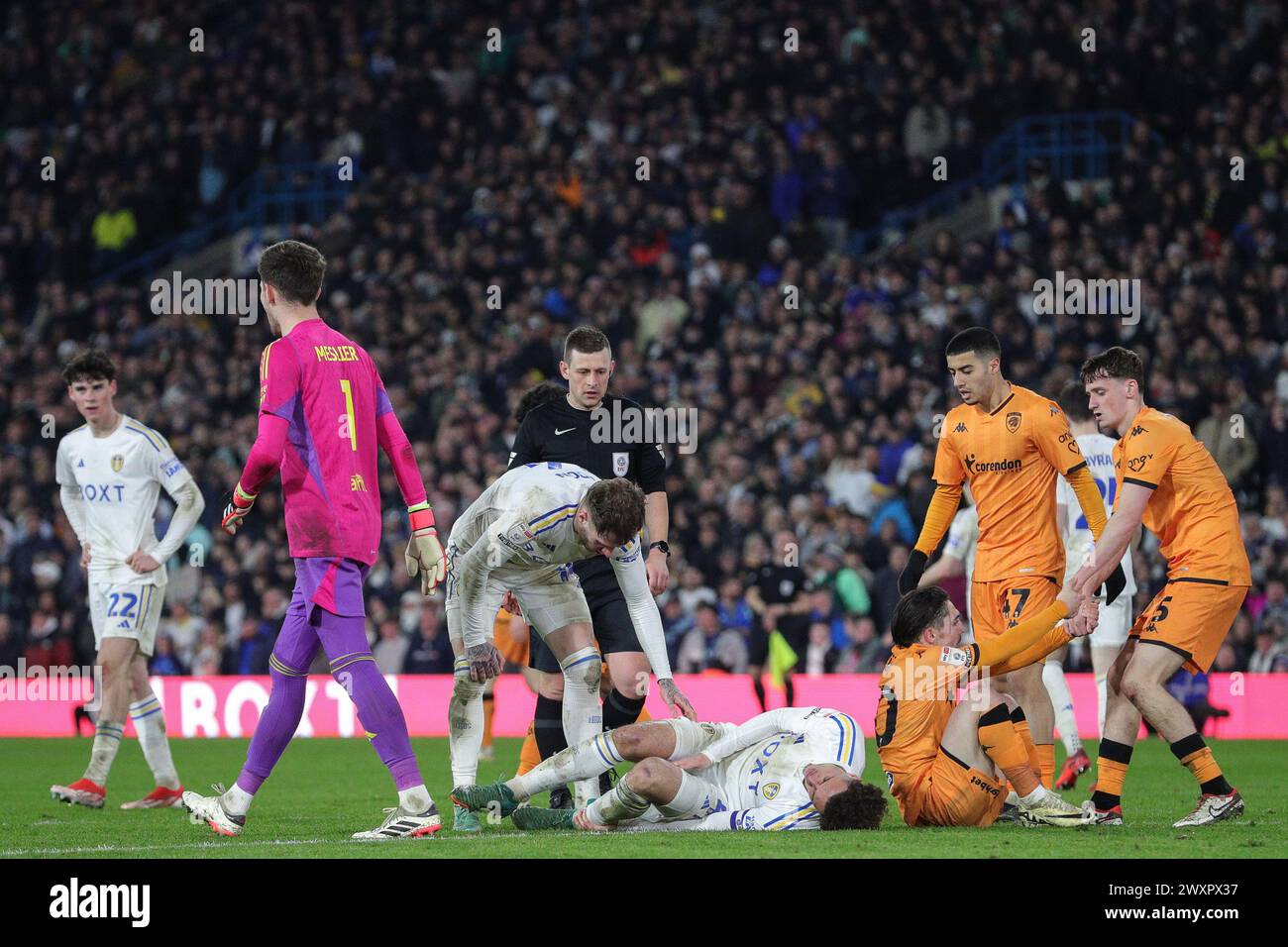 Leeds, UK. 01st Apr, 2024. Ethan Ampadu of Leeds United goes down ...