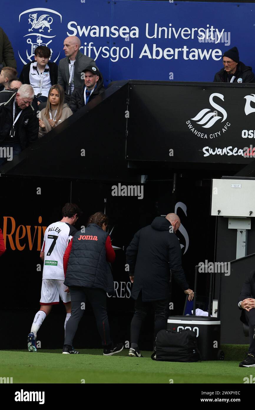 Swansea, UK. 01st Apr, 2024. Joe Allen of Swansea city leaves the game ...