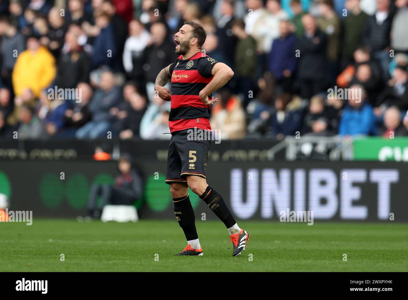 Swansea, UK. 01st Apr, 2024. Steve Cook of Queens Park Rangers reacts ...