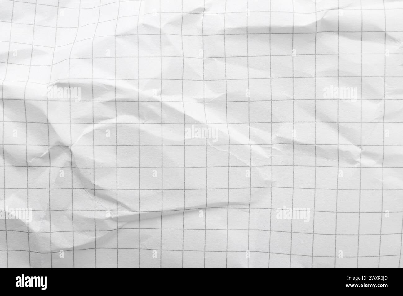 Crumpled checkered notebook sheet hi-res stock photography and images ...