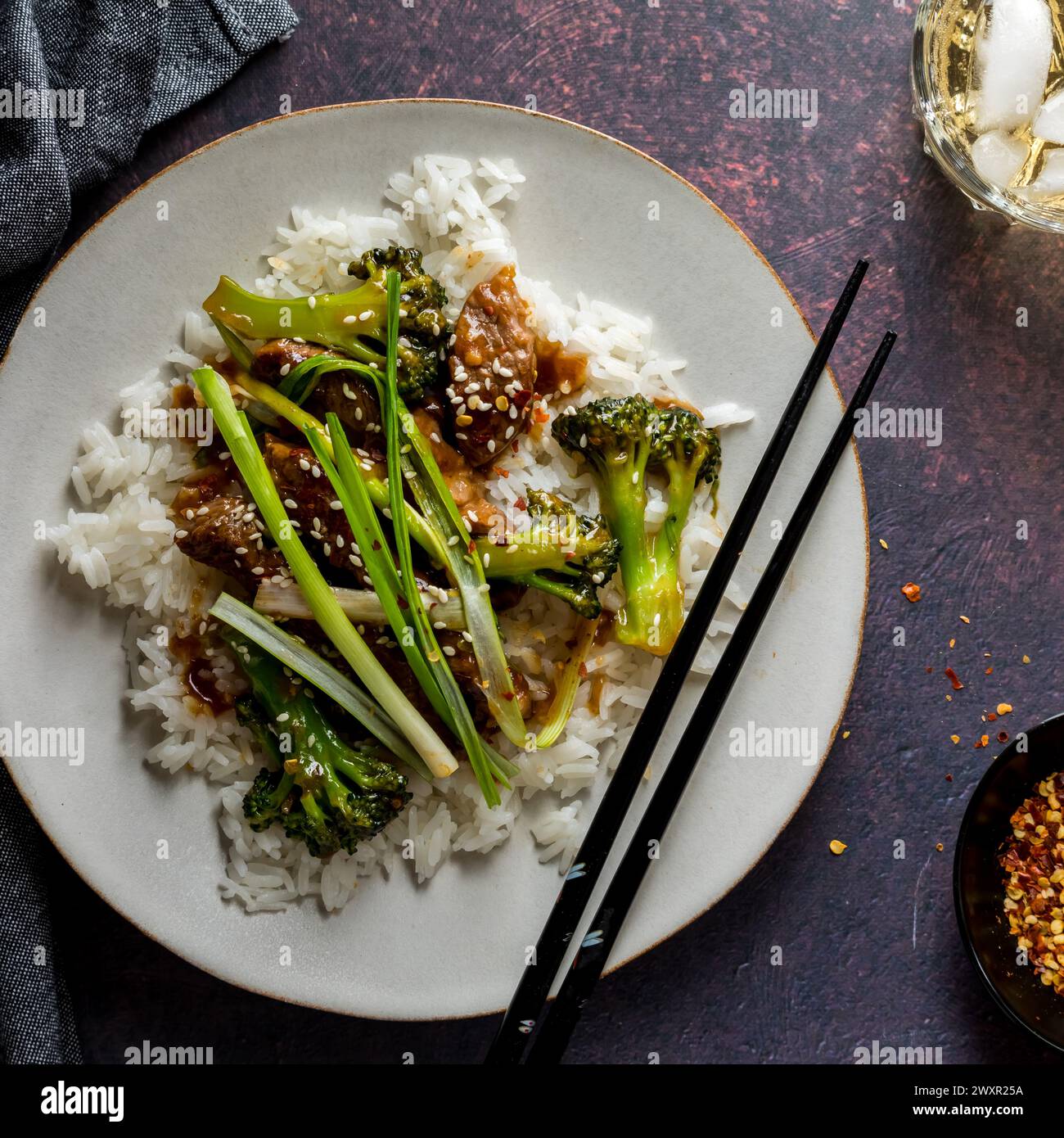 A plate of Mongolian beef on rice, ready for eating Stock Photo - Alamy