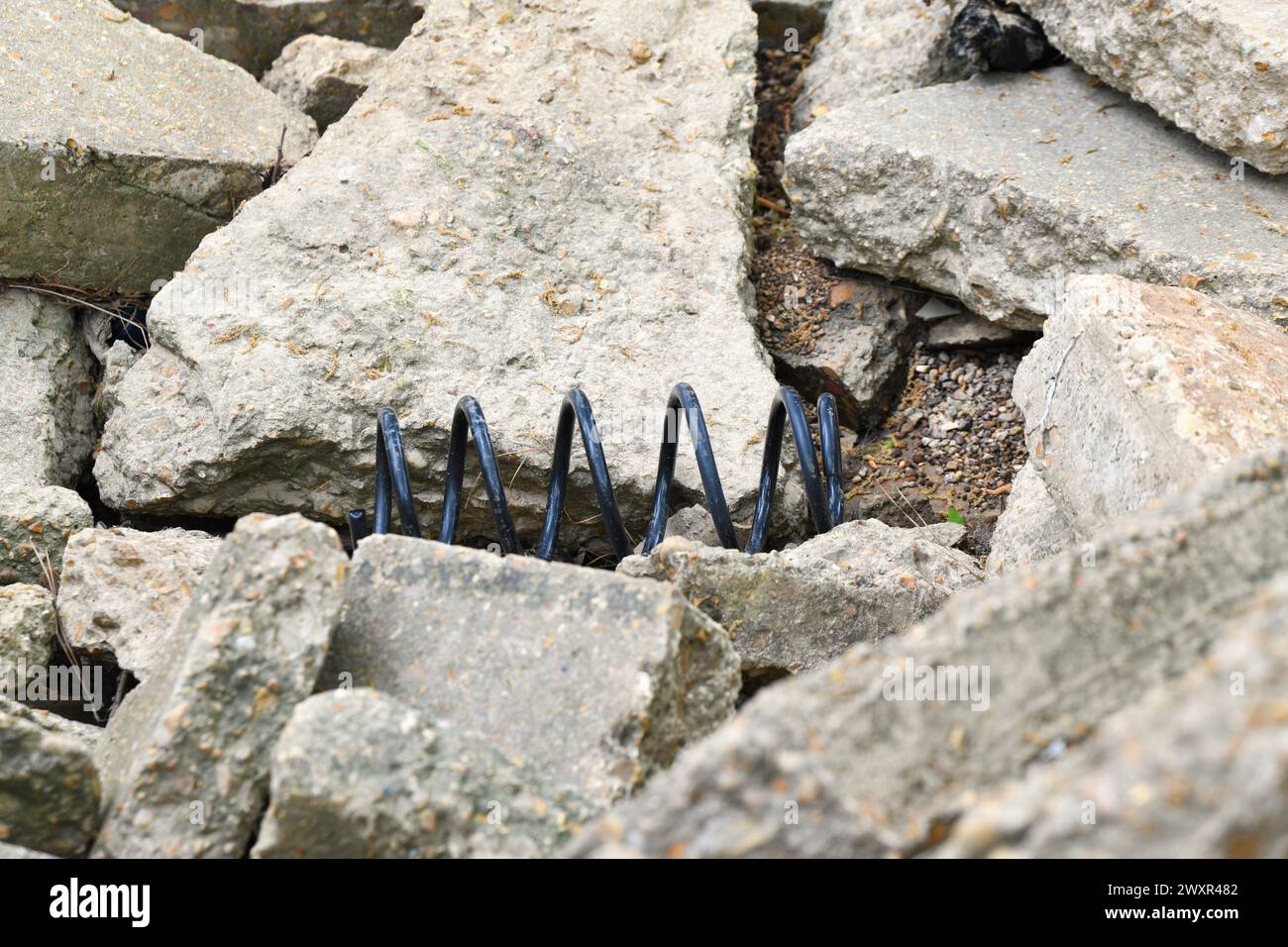 Trashed automobile tire with tie rod end and spring Stock Photo - Alamy