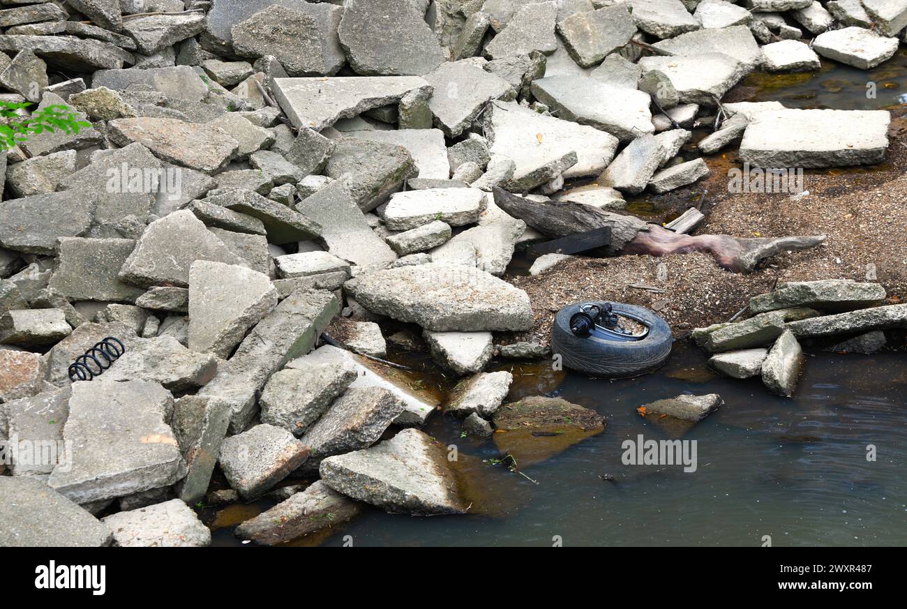 Trashed automobile tire with tie rod end and spring Stock Photo - Alamy