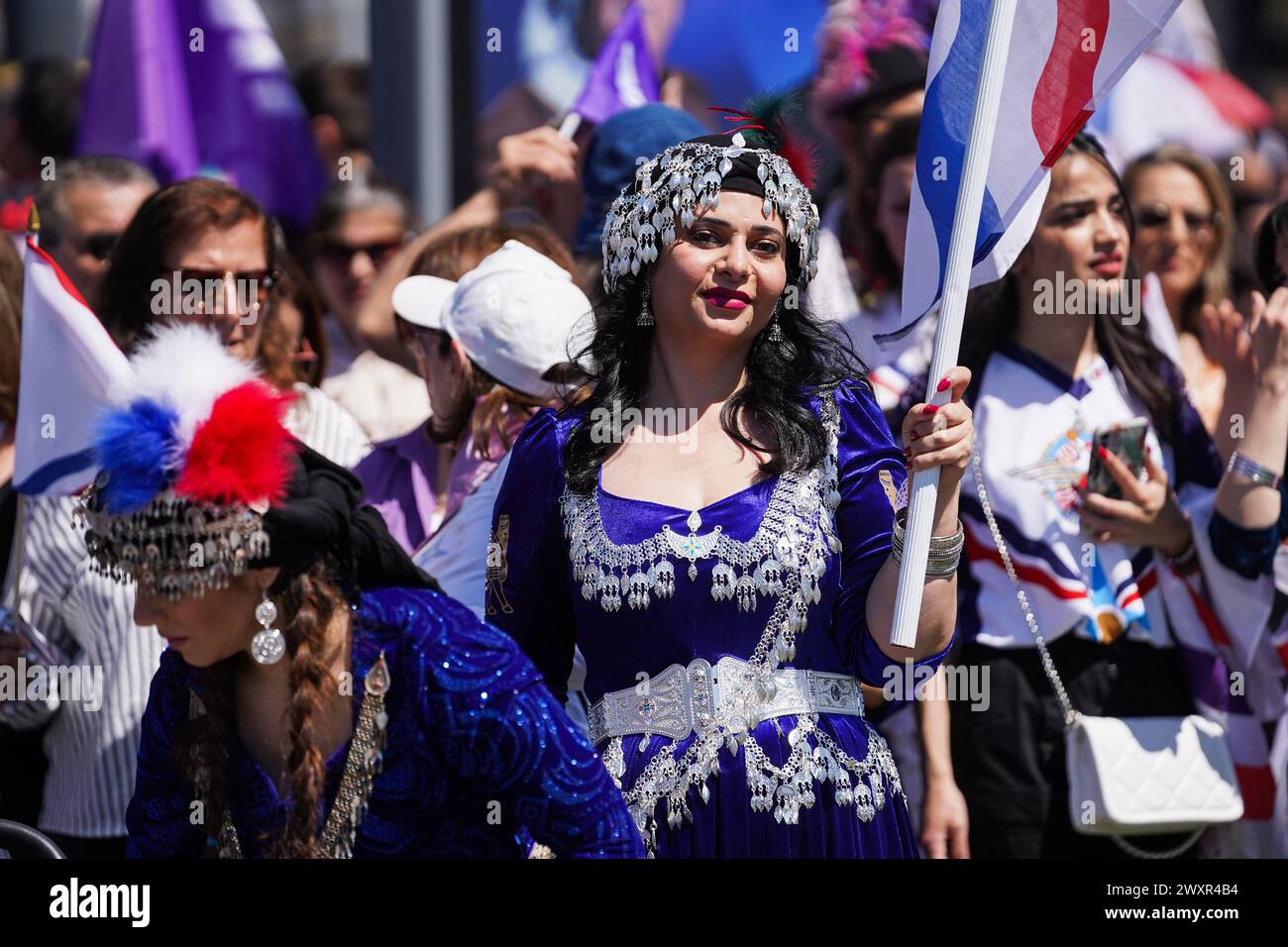 Dohuk, Iraq. 01st Apr, 2024. An Assyrian young woman dressed in ...
