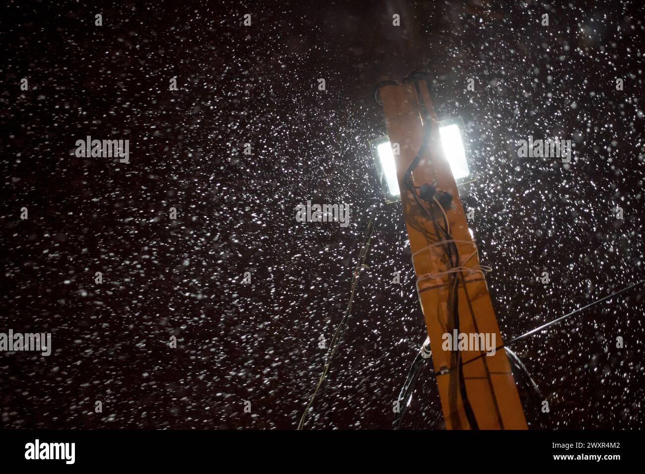 Heavy snowfall at night under the light of a lantern Stock Photo - Alamy
