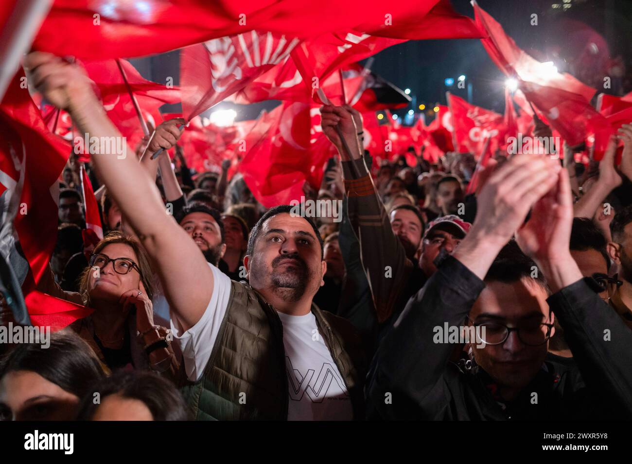 Citizens shout slogans and wave Turkish and CHP party flags during the ...