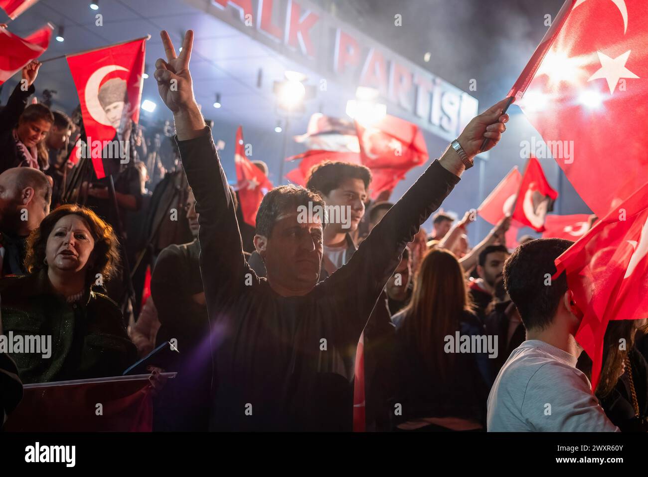 Citizens shout slogans and wave Turkish and CHP party flags during the ...