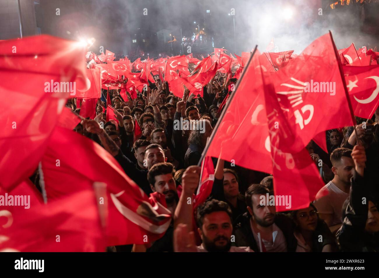 Citizens shout slogans and wave Turkish and CHP party flags during the ...