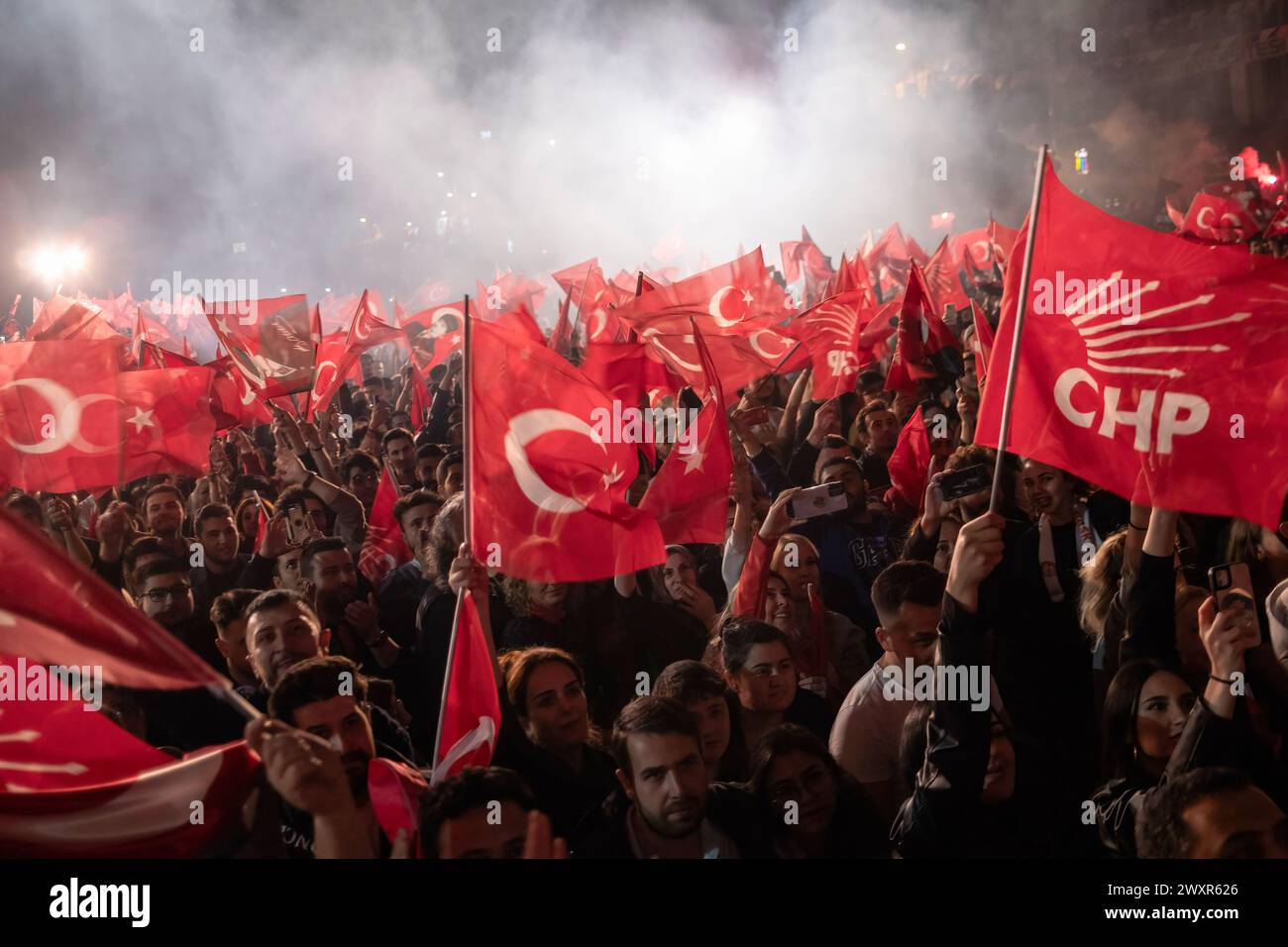 Citizens shout slogans and wave Turkish and CHP party flags during the ...
