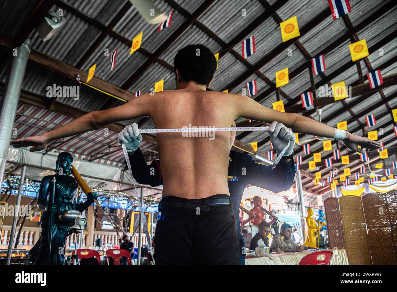 Bangkok, Thailand. 01st Apr, 2024. A Thai man has his chest measured by ...