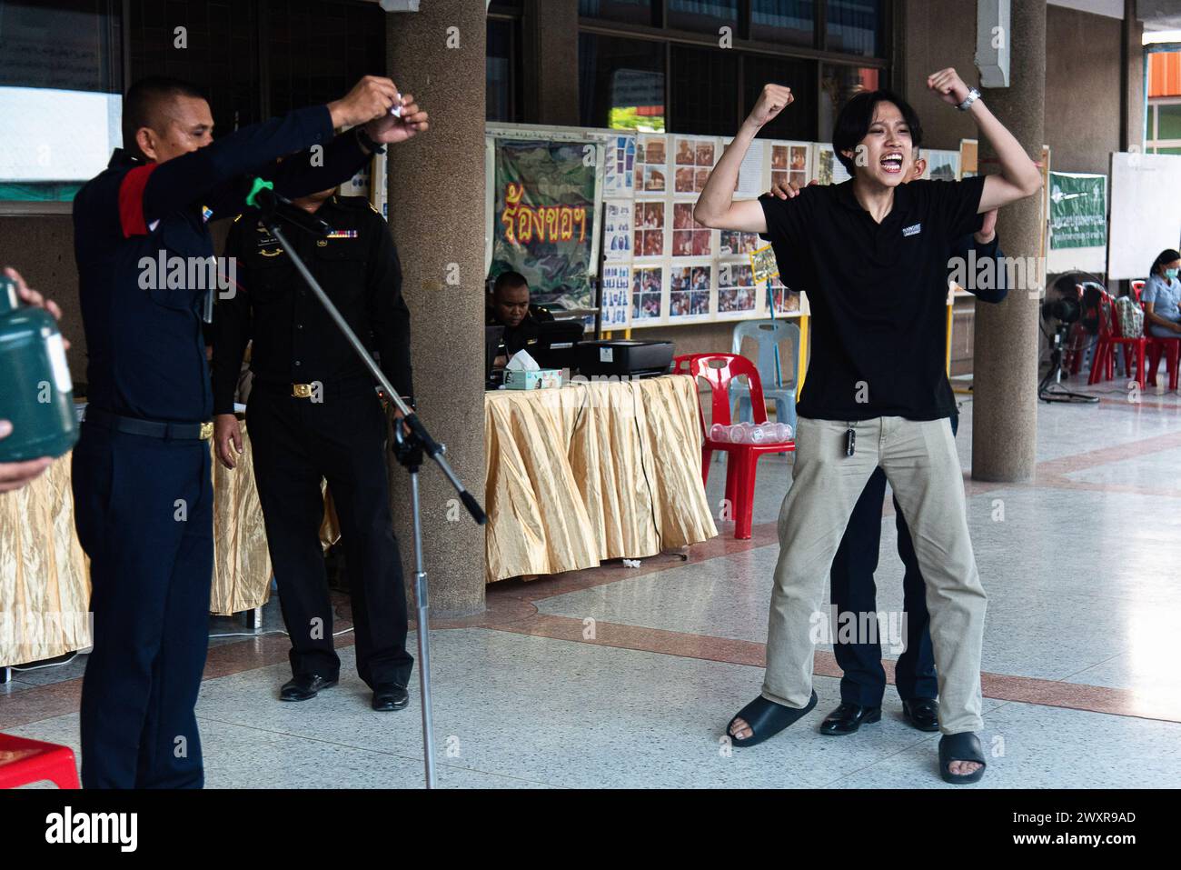 Bangkok, Thailand. 01st Apr, 2024. A Thai man celebrates after drawing ...