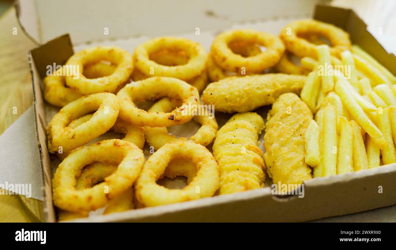 Set of takeaway paper boxes with different fast food, french fries ...