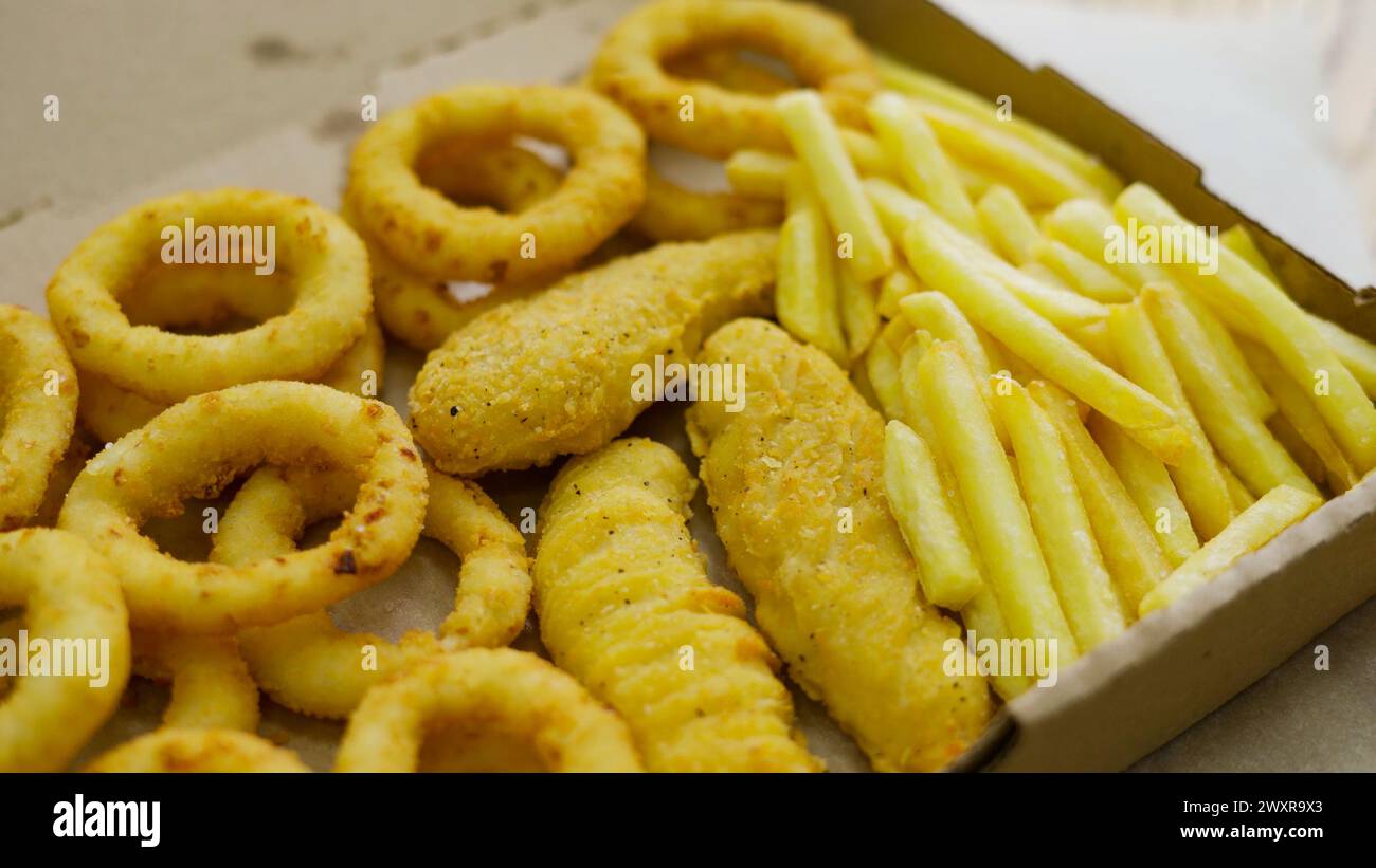 Set of takeaway paper boxes with different fast food, french fries ...