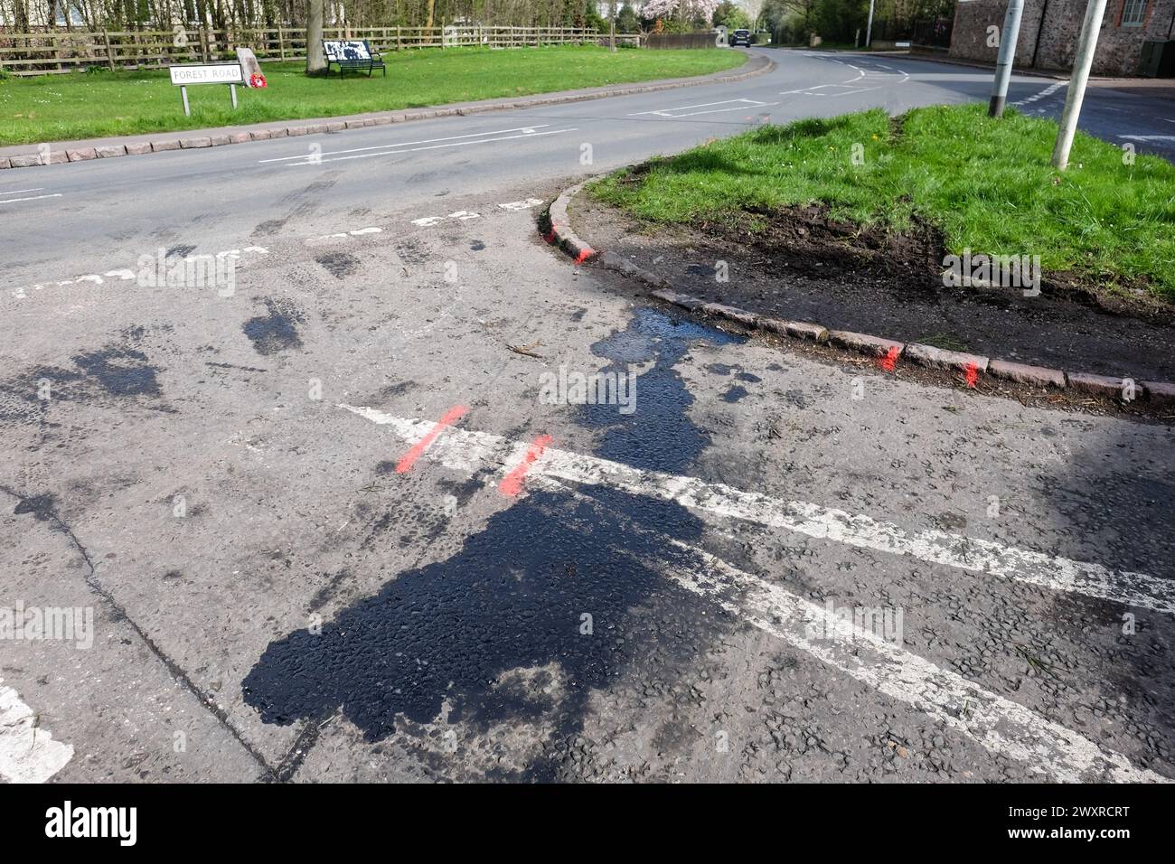 oil spill on a road after a accident Stock Photo - Alamy