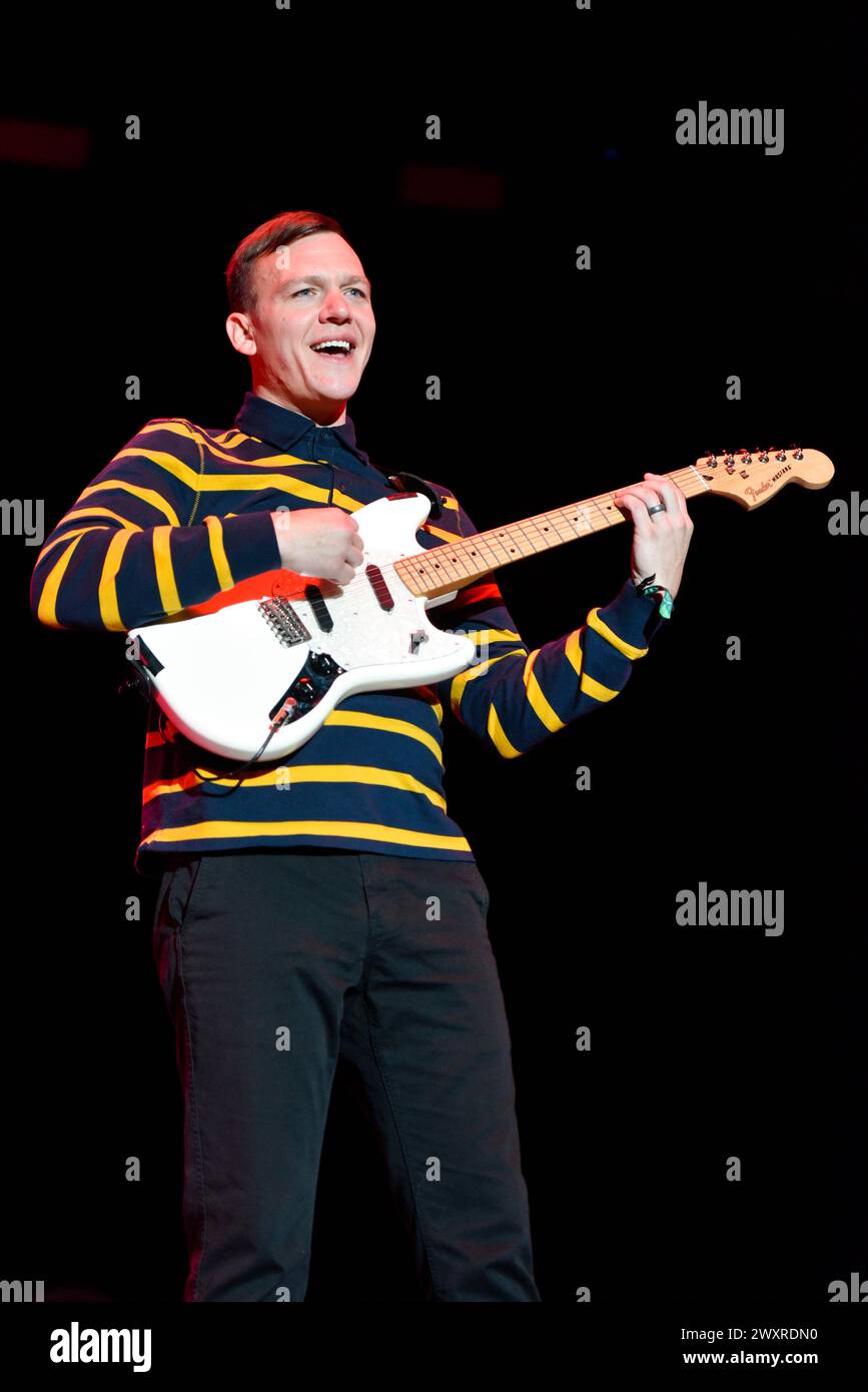 Guitarist Brad Shultz of Cage the Elephant on stage Stock Photo - Alamy