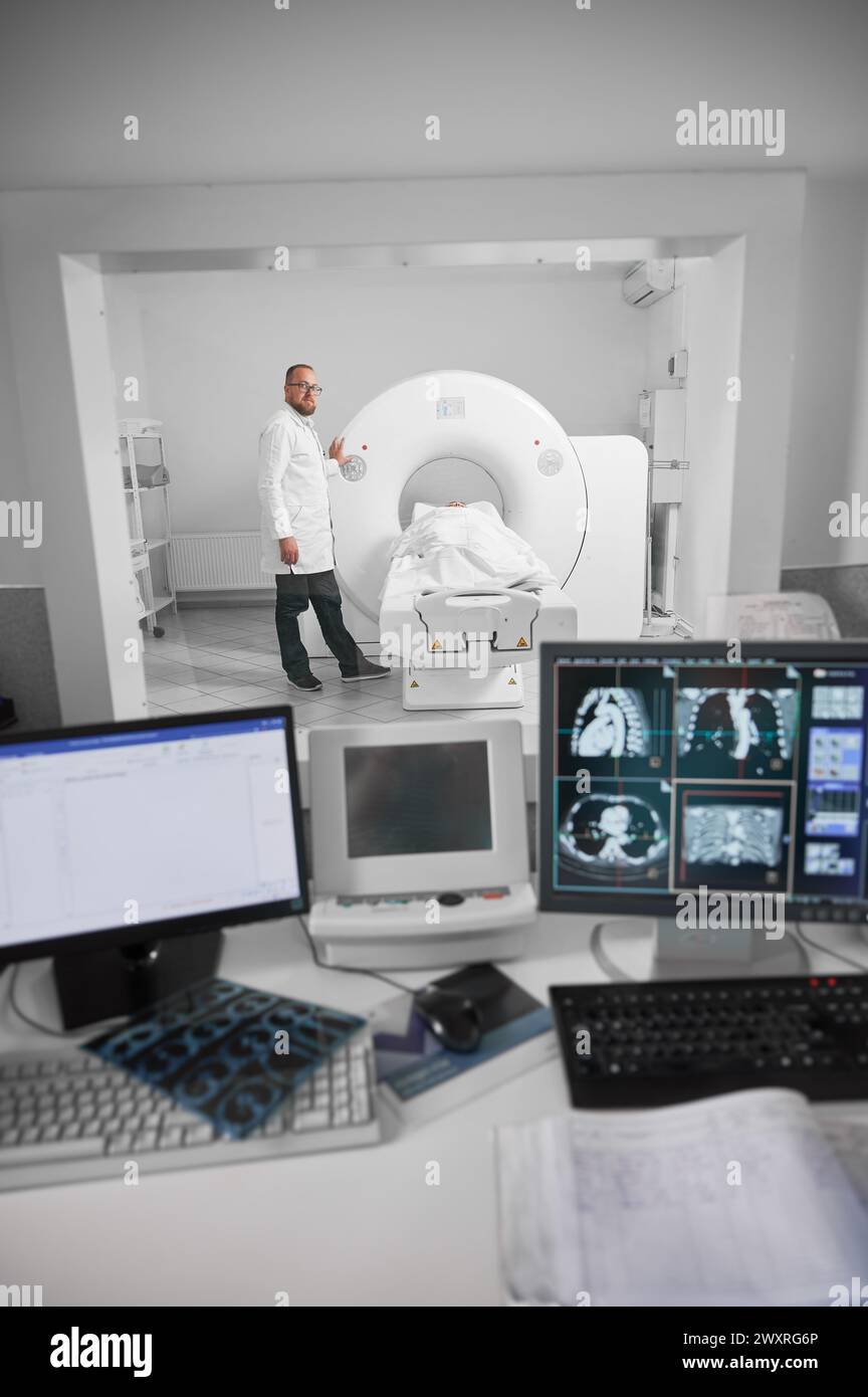 Medical computed tomography or MRI scanner. Doctor making MRI, patient ...