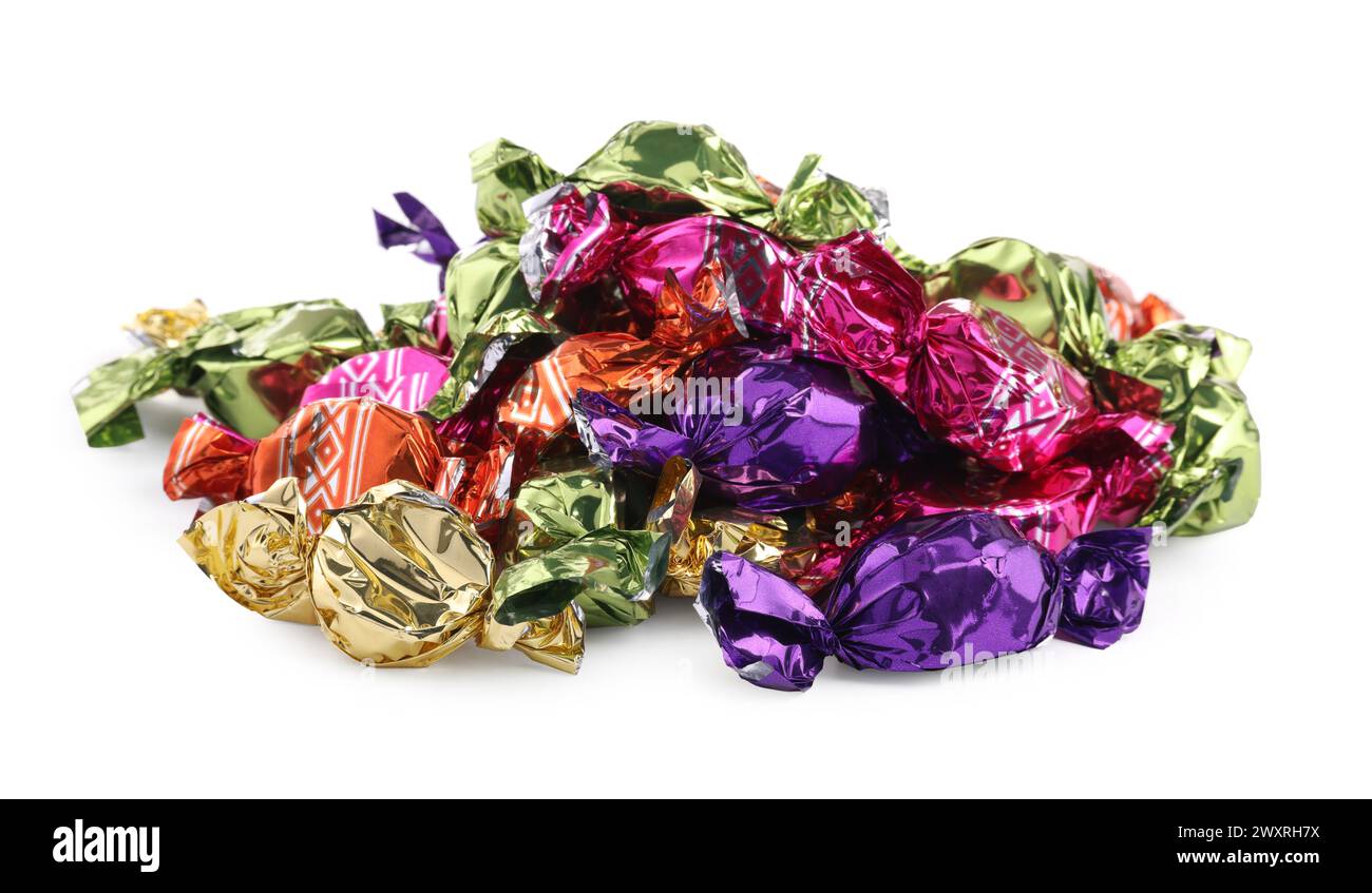 Candies in colorful wrappers isolated on white Stock Photo - Alamy