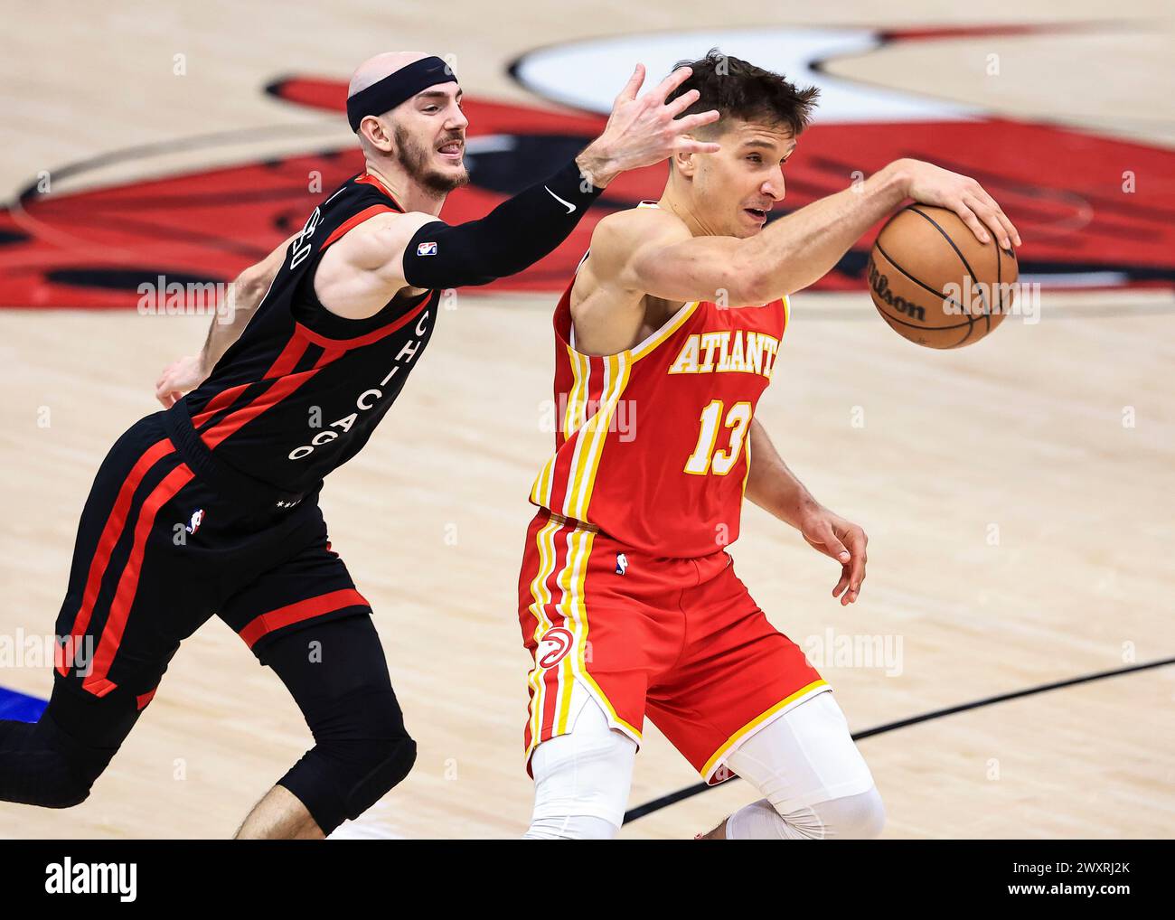 Chicago, USA. 1st Apr, 2024. Atlanta Hawks guard Bogdan Bogdanovic (R ...