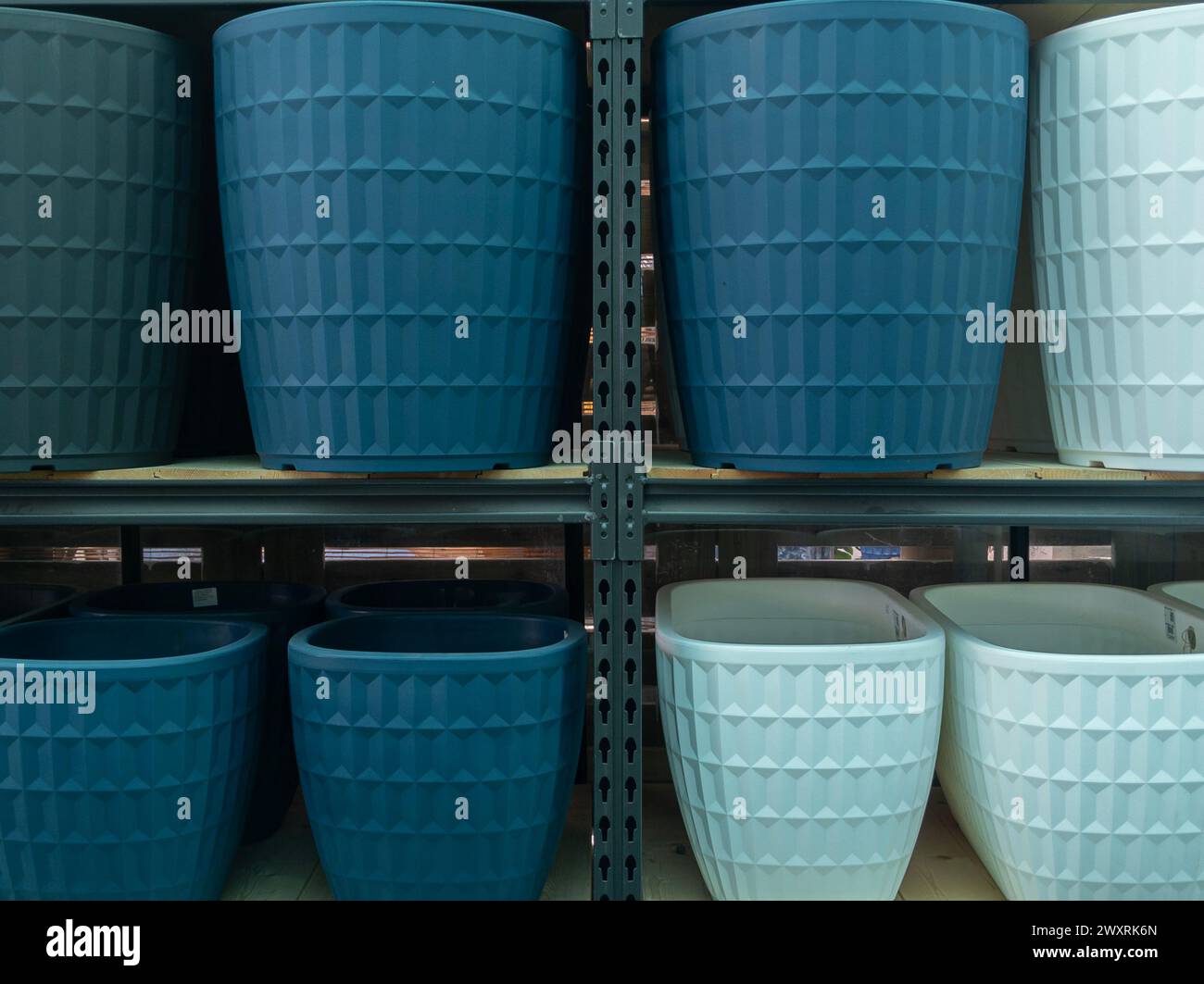 Stylish designer planters made from recycled plastic on display in a ...