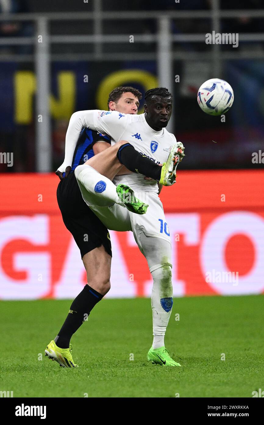 M Baye Niang (Empoli)Benjamin Pavard (Inter) during the Italian Serie A ...