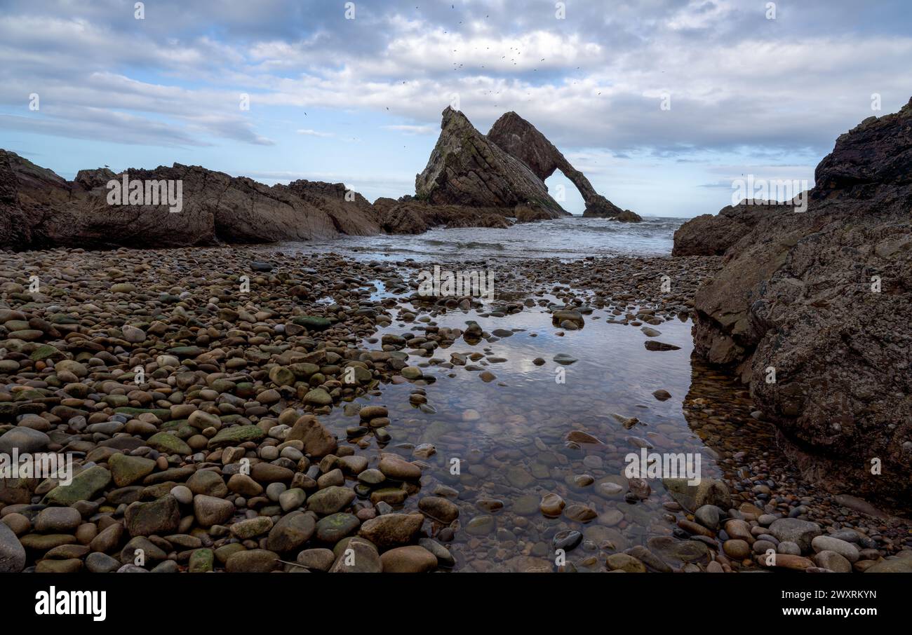 Bow Fiddle Rock near PortKnockie on the North East coast of Scotland ...