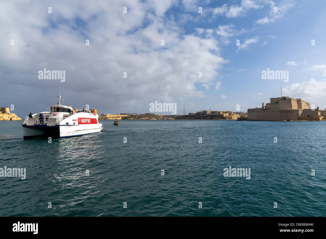 Valletta, Malta - 23 December, 2023:fast ferry bringing people across ...