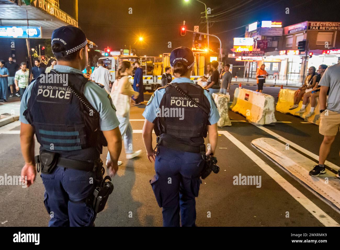 Two Police officers walking (foot patrol) in Haldon Street Lakemba ...