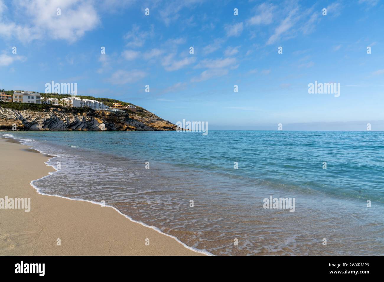 Picturesque golden sand beach and clear turquoise waters at Cala ...