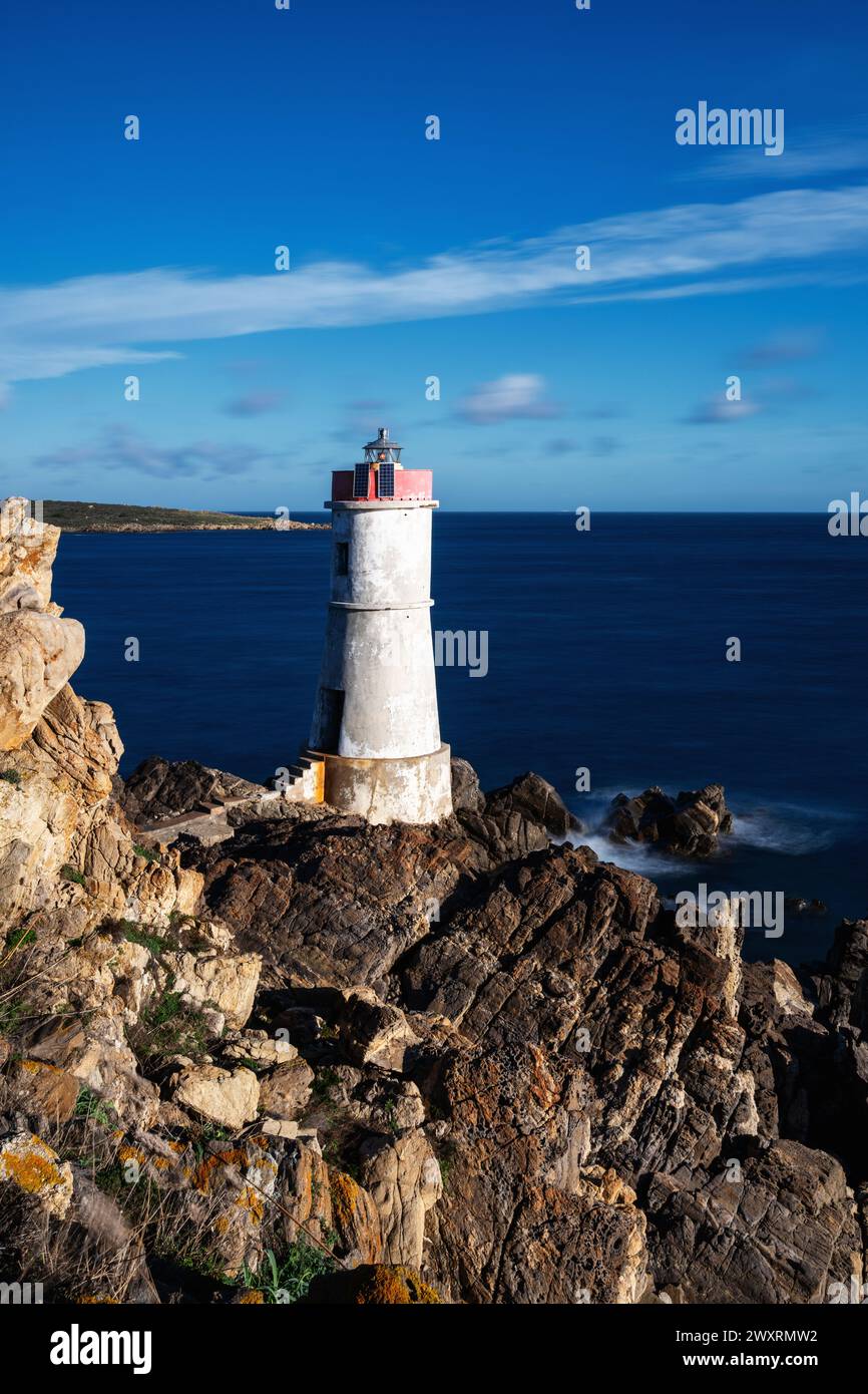 A vertical view of the old Capo Ferro Lighthouse in Sardinia Stock ...