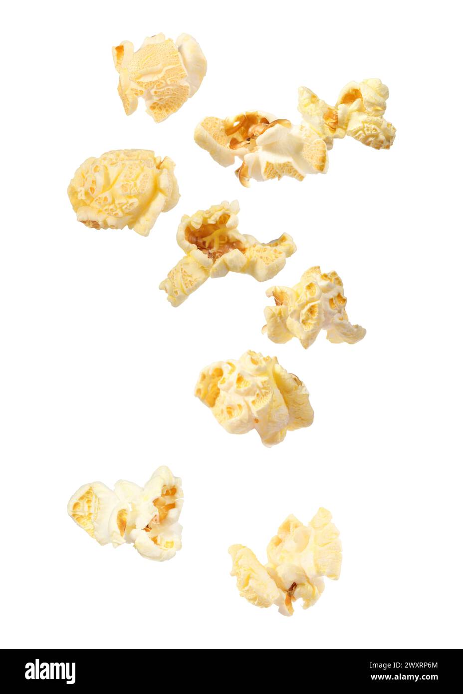 Tasty fresh popcorn flying on white background Stock Photo - Alamy