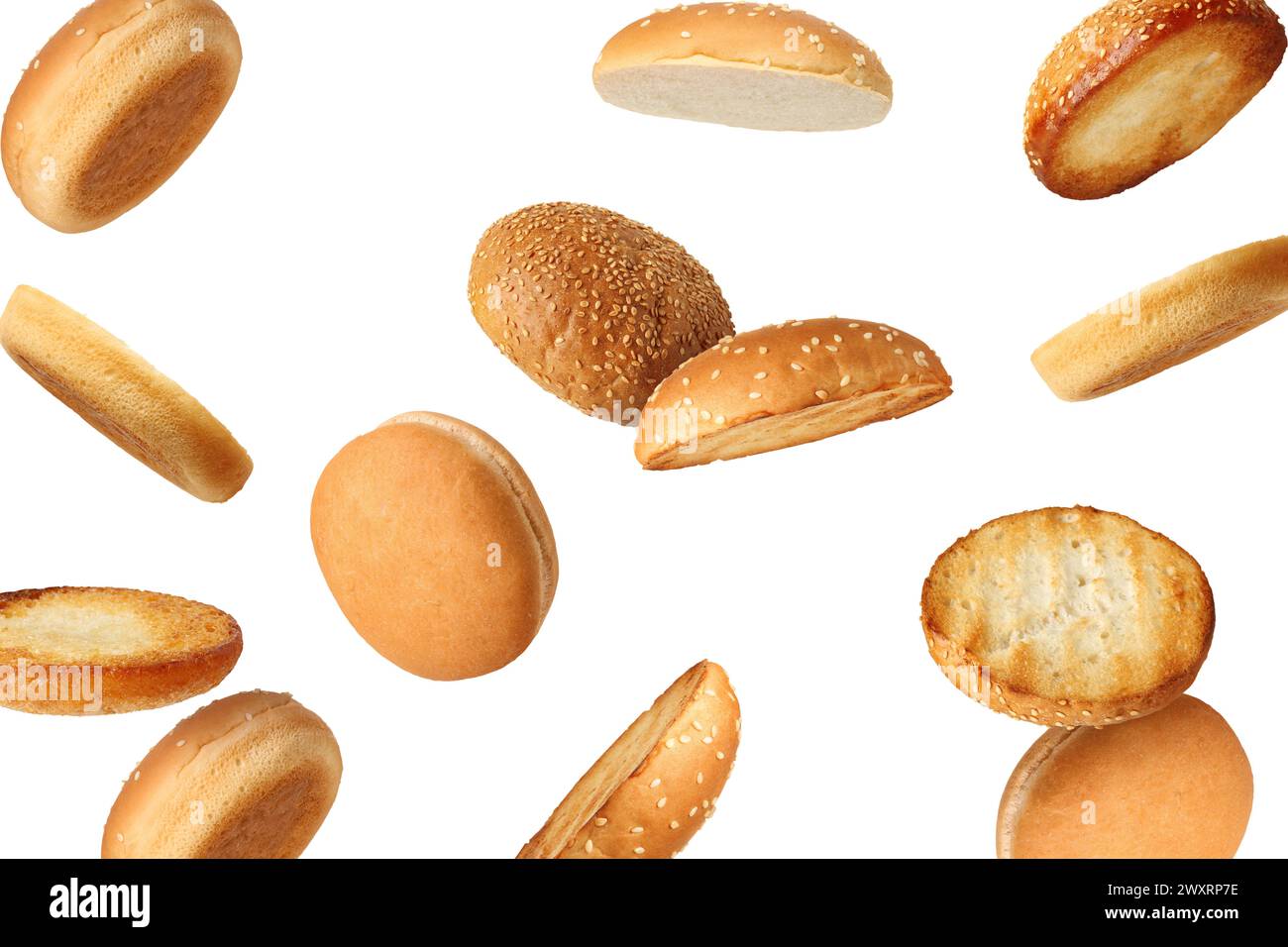 Fresh burger buns falling on white background Stock Photo - Alamy