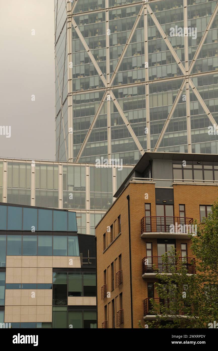Several tall buildings in a row on an urban street in London Stock ...