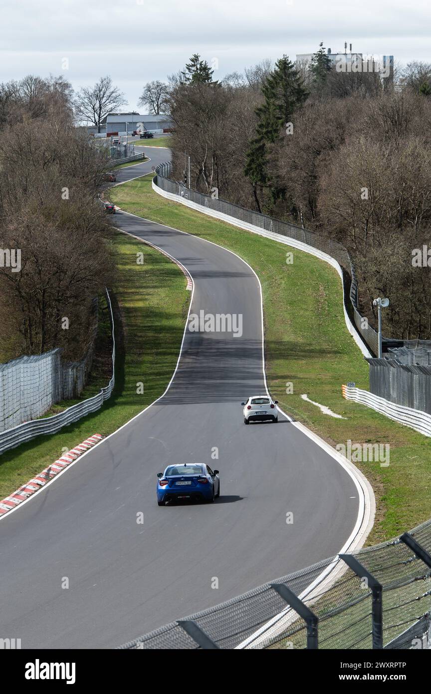 SYMBOL - 31 March 2024, Rhineland-Palatinate, Nürburg: Cars drive on ...