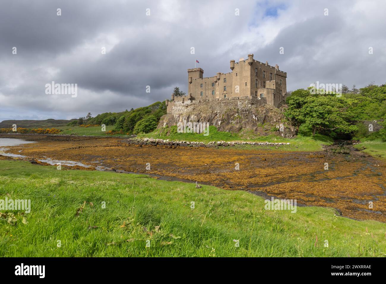 Dunvegan Castle, with its robust stone walls, stands guard over a ...