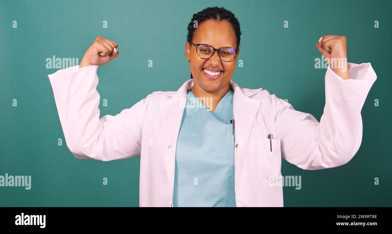 Woman flex arm muscles hi-res stock photography and images - Alamy