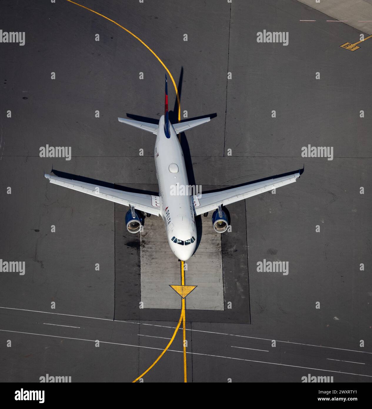 An aerial view of an aircraft parked at an airport Stock Photo - Alamy