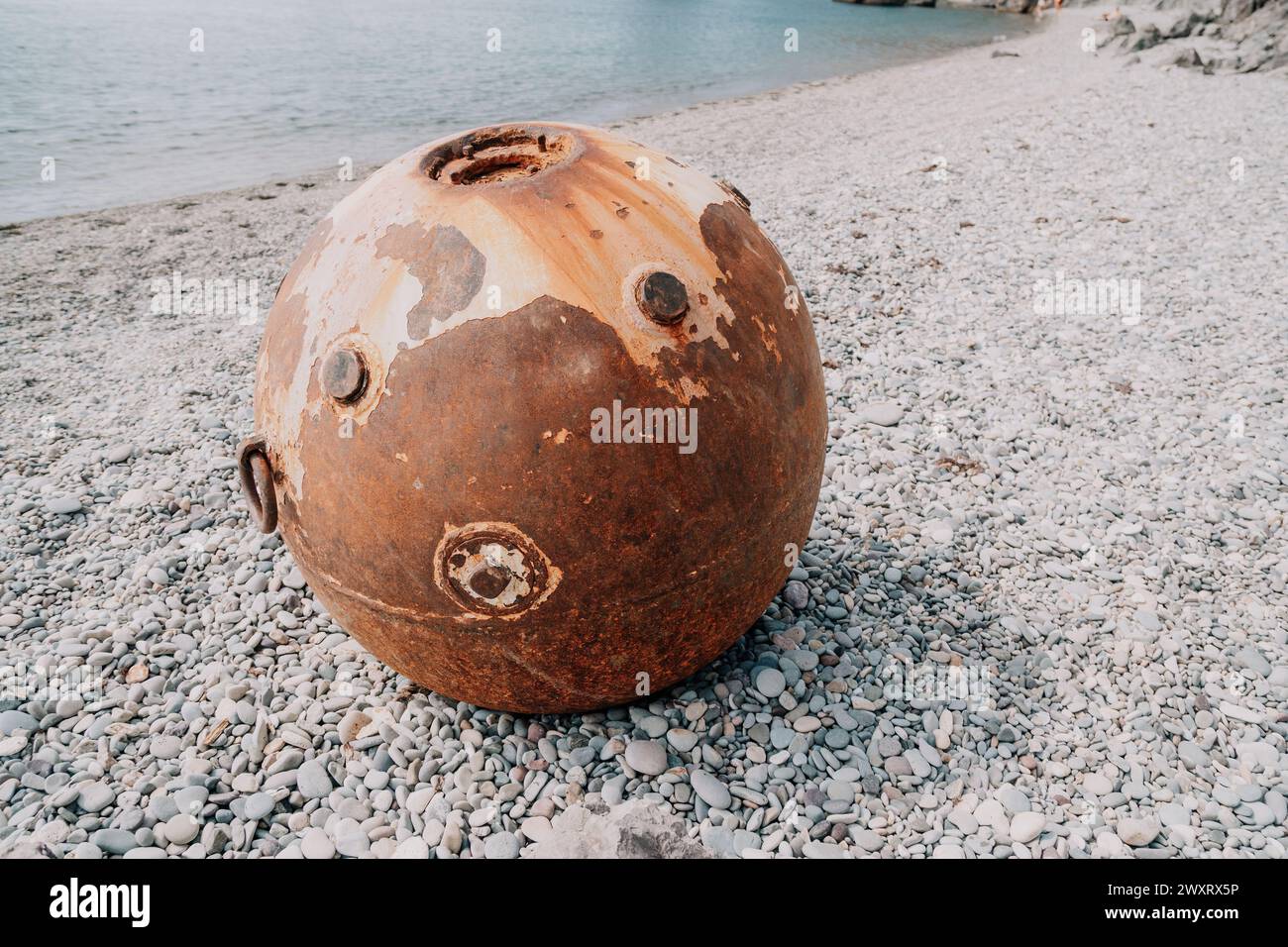 Old rusty sea mine on the beach Stock Photo - Alamy