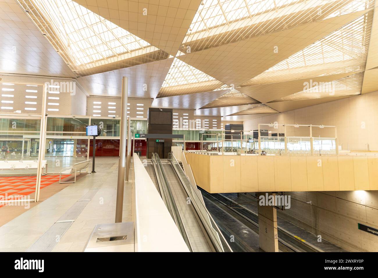 A large, open space with a lot of windows and a lot of light. The space ...