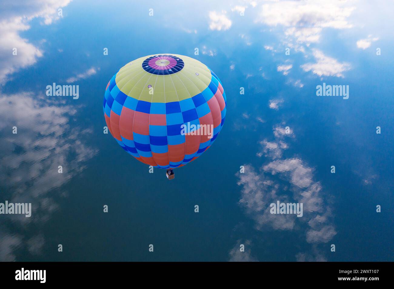 Aquatic Ascend: Balloon Floating Peacefully on the Water Stock Photo ...