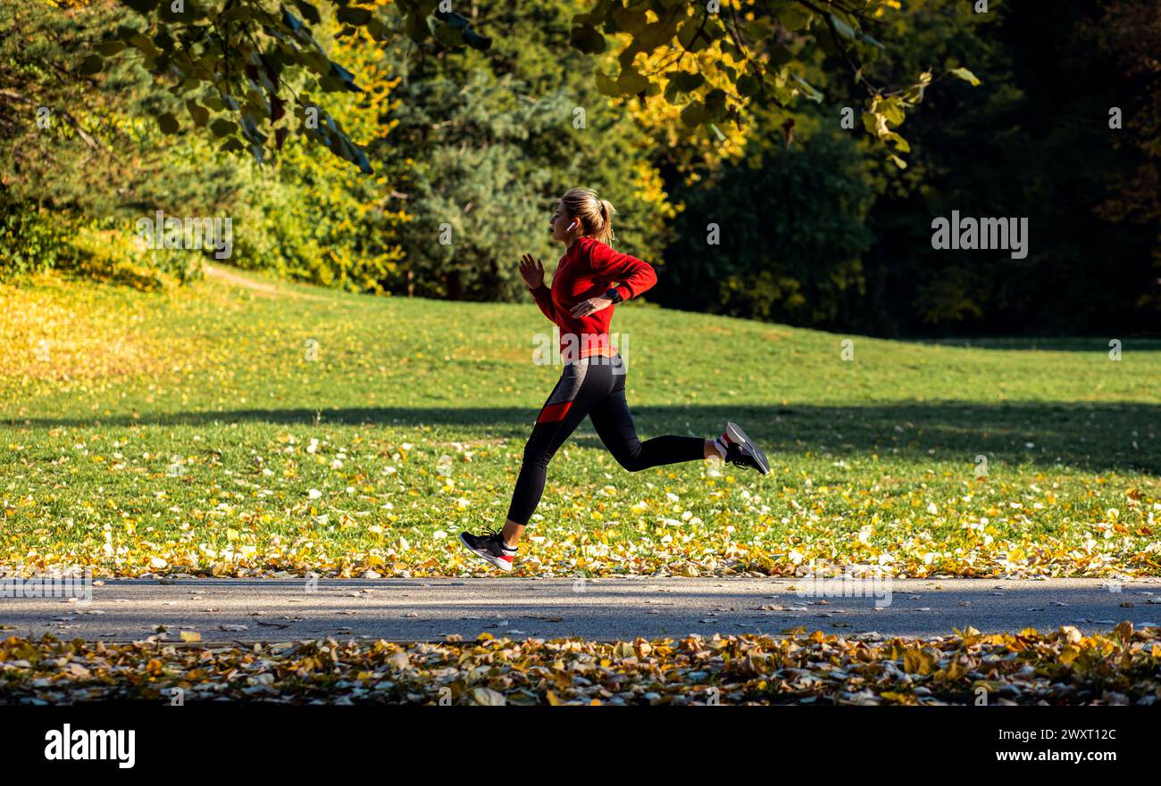 Fitness woman running in spring hi-res stock photography and images - Alamy