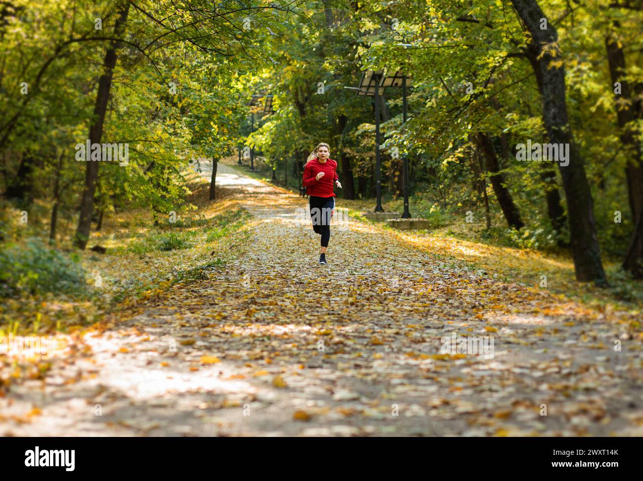 Fitness woman running in spring hi-res stock photography and images - Alamy