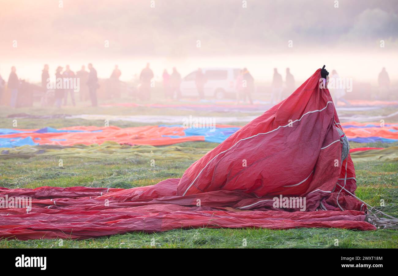 Earthbound Wonder: Colorful Balloon Lies Quietly on the Ground Stock ...