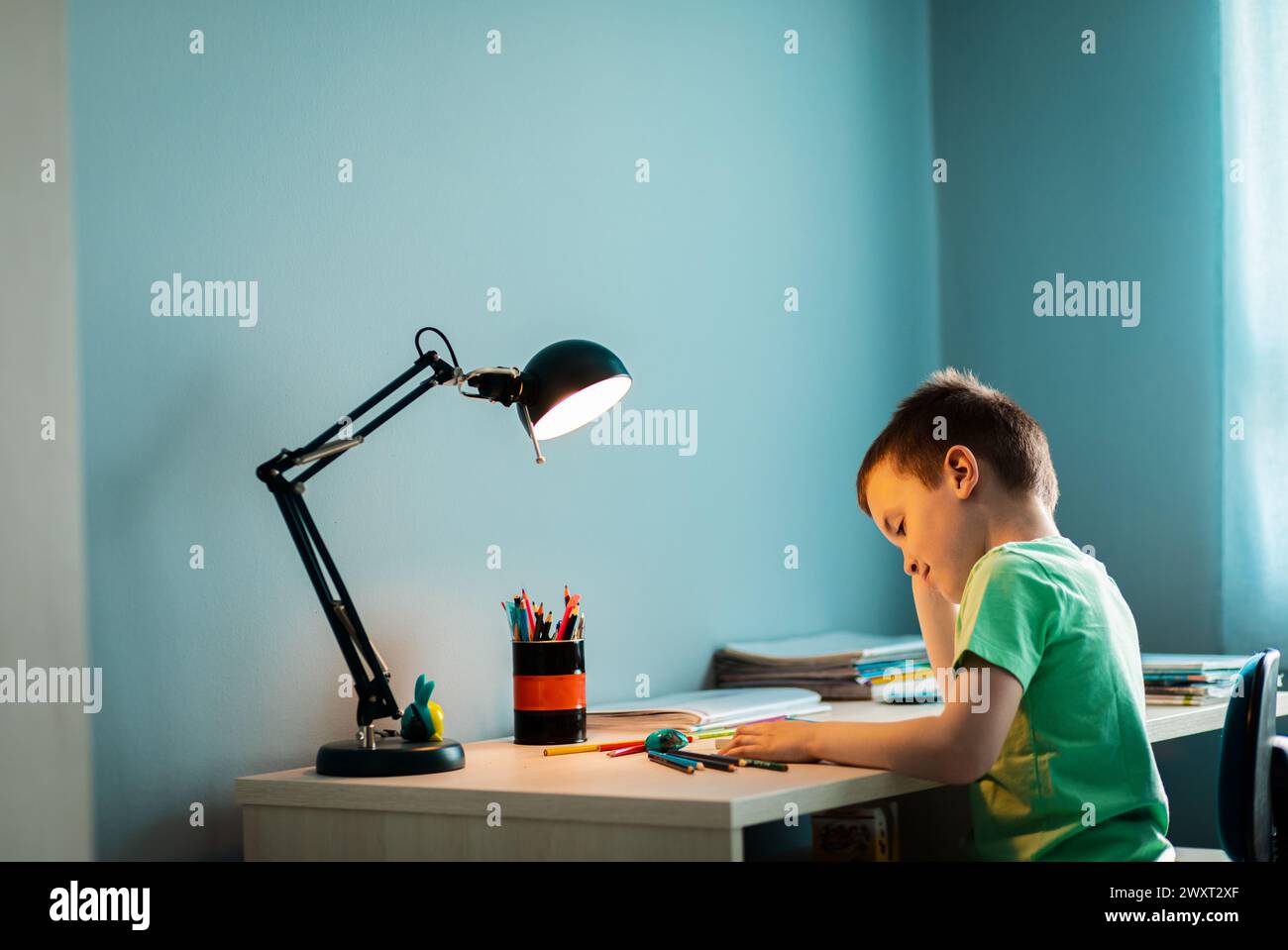 Boy homework lamp hi-res stock photography and images - Alamy