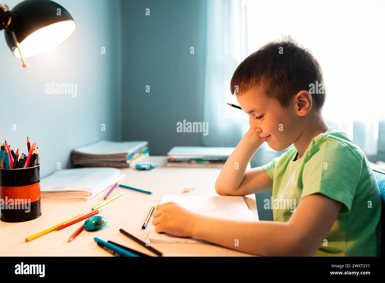 Boy studying desk hi-res stock photography and images - Alamy