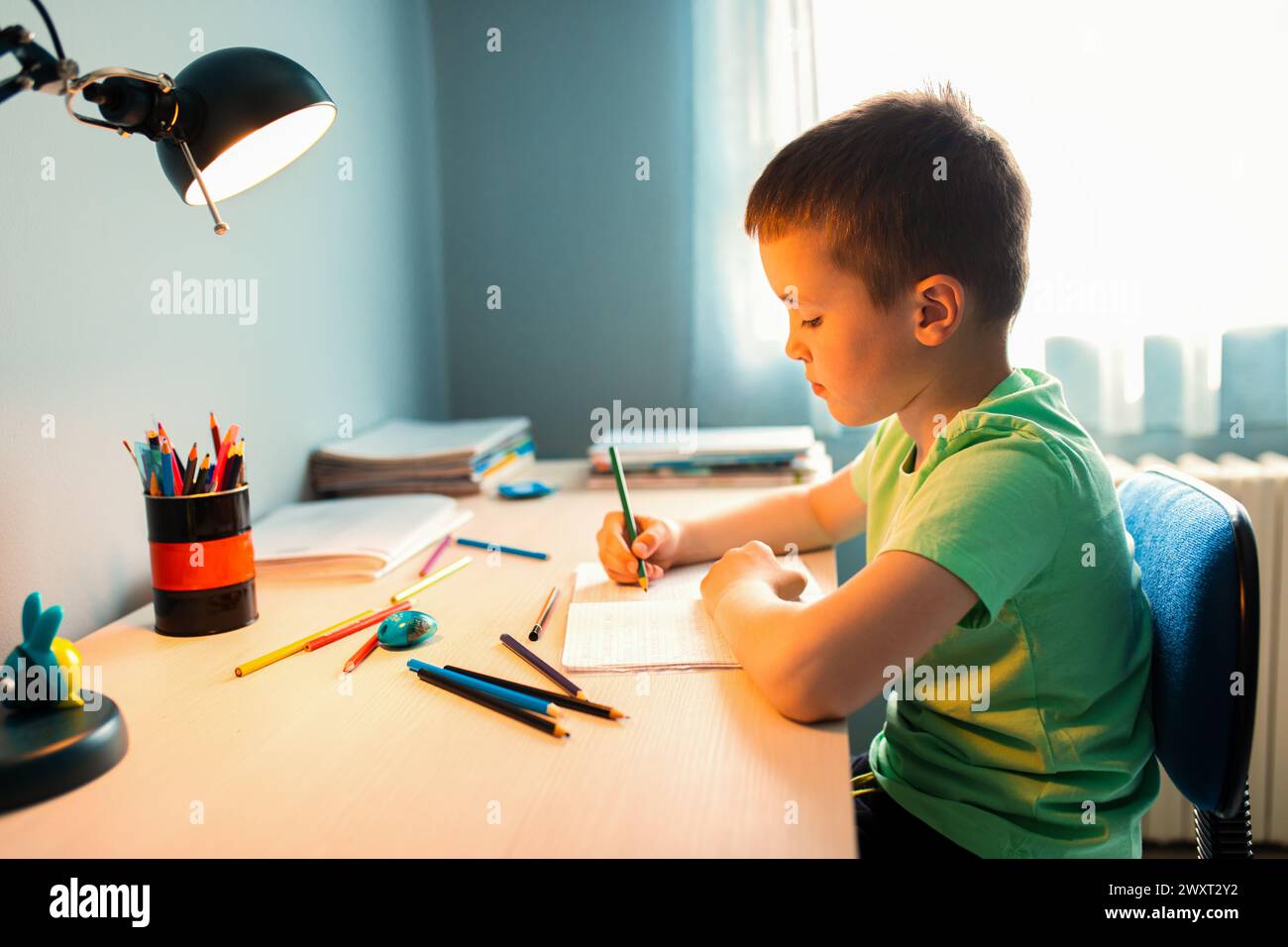Boy studying desk hi-res stock photography and images - Alamy
