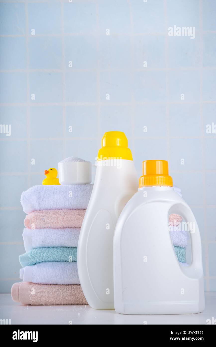 Laundry, washing and cleaning concept. Stack of clean towels, with ...
