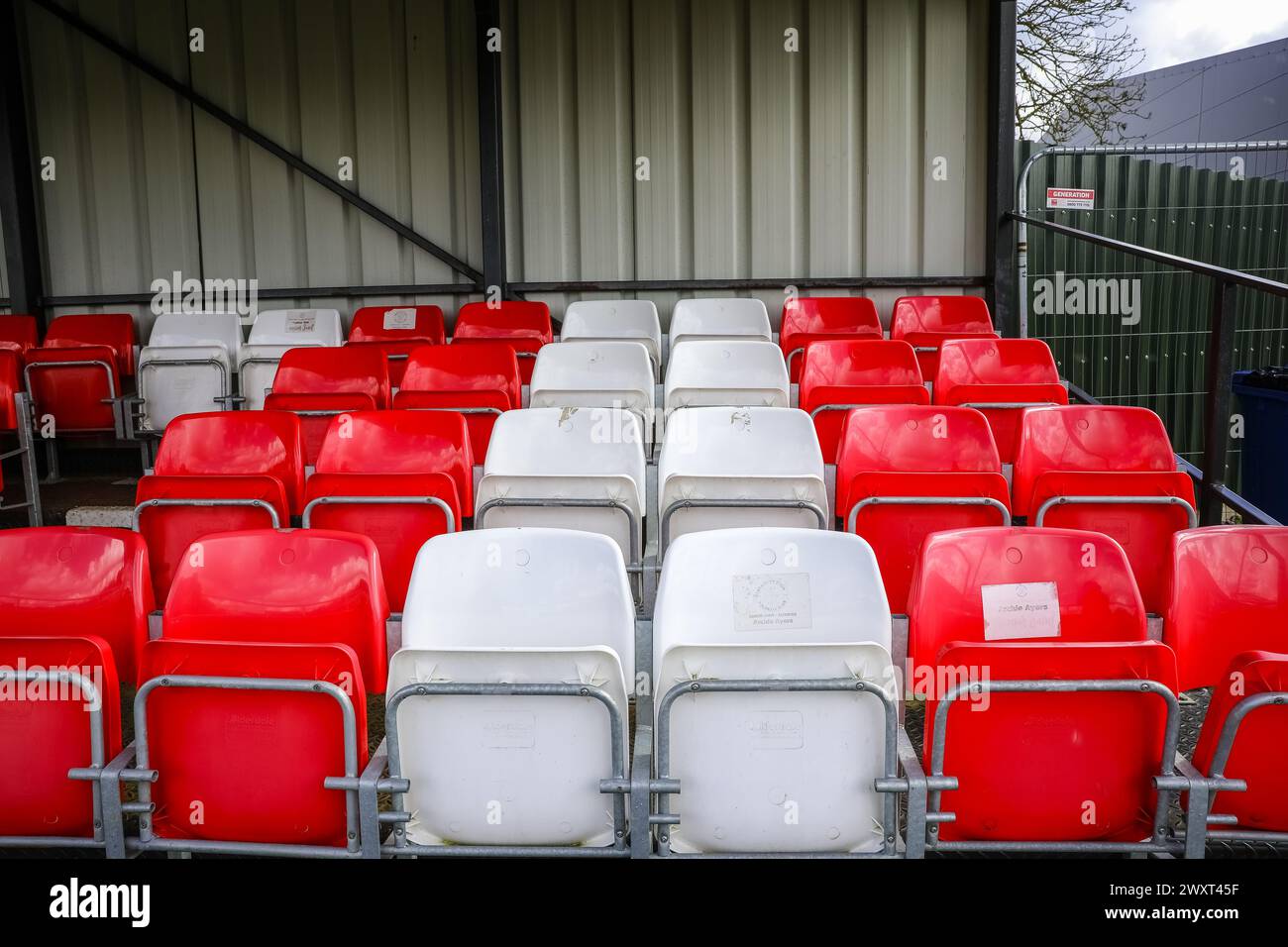 Red and white seats in the Brackley Town Football Club family stand ...